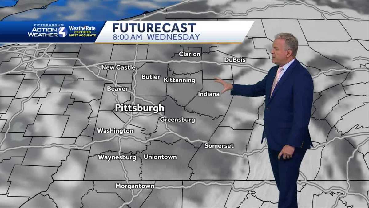 Mostly cloudy Wednesday, isolated shower possible