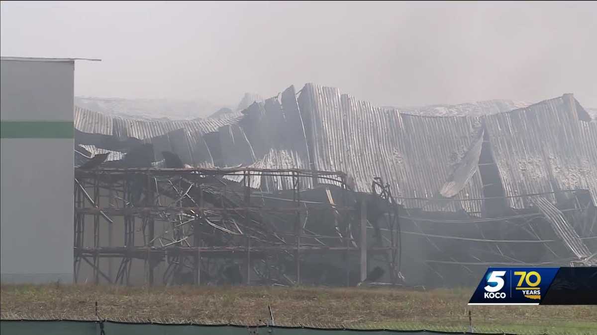 Crews working to put out Dollar Tree warehouse fire
