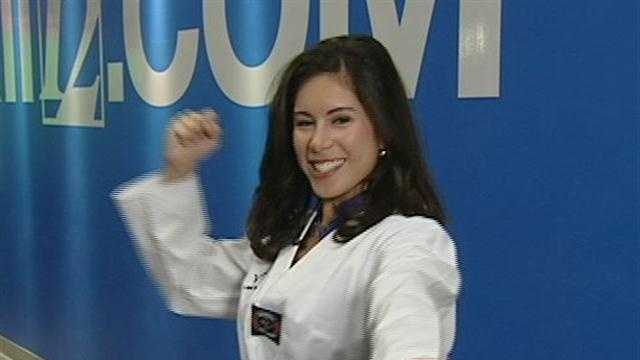 Veronica shows her Tae Kwon Do Olympic moves