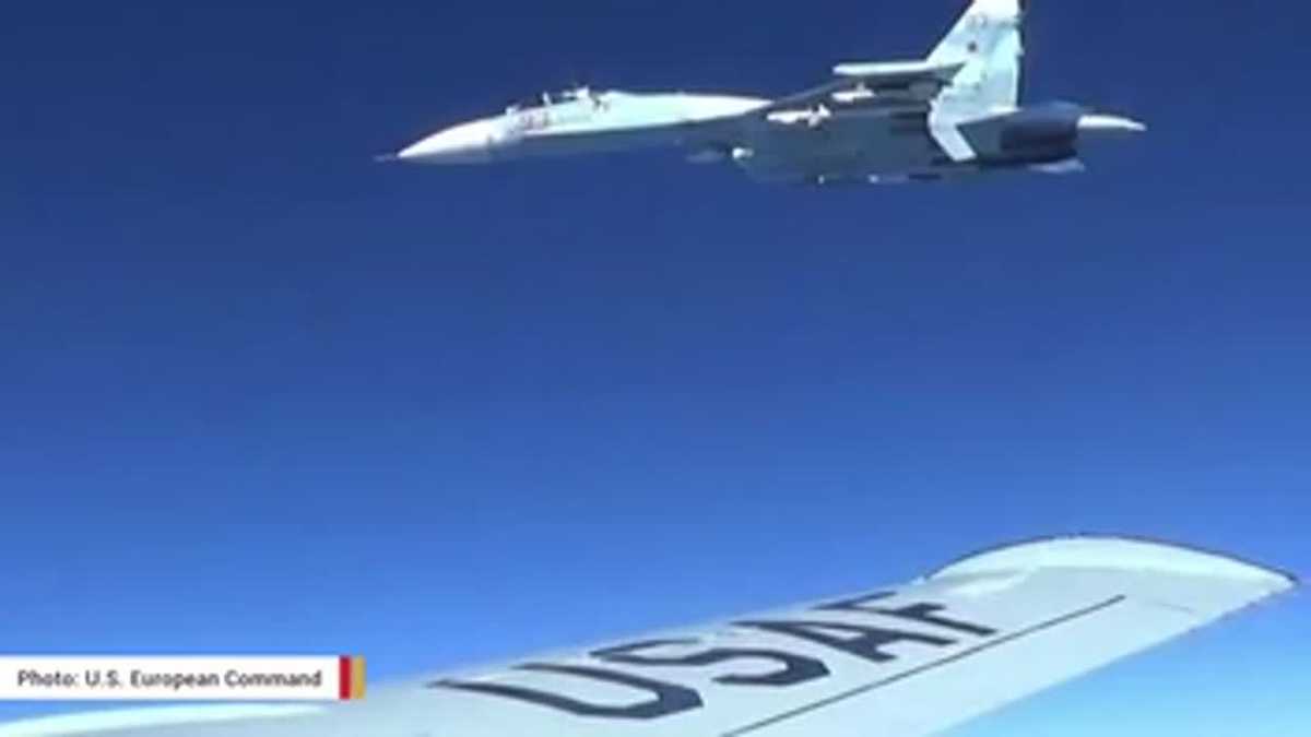 Russian jet flies feet away from US aircraft