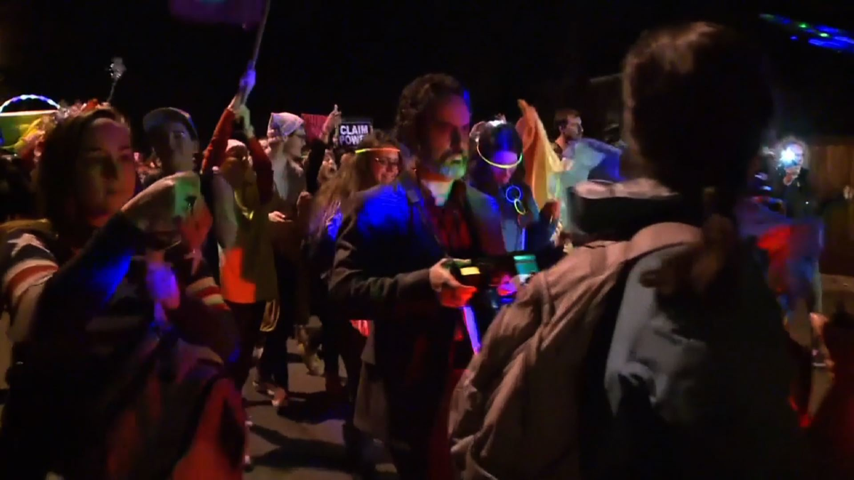 LGBT dance party springs up outside Mike Pence's home