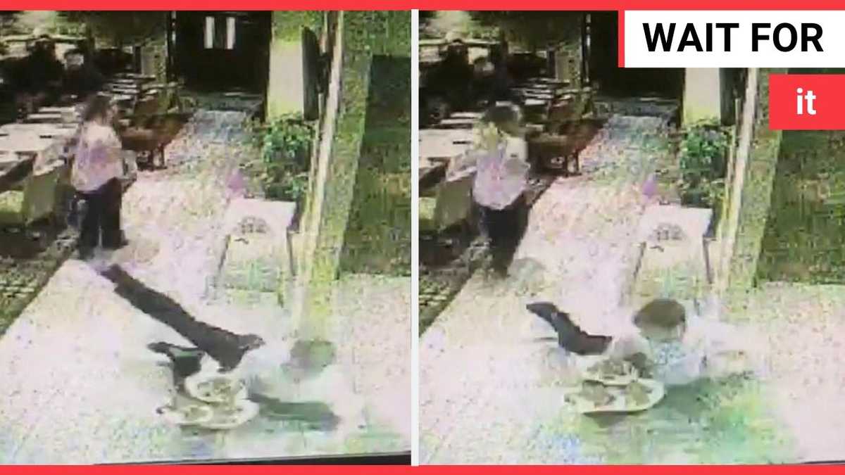 Whoa! Watch the extraordinary moment a waiter fell to the floor but ...
