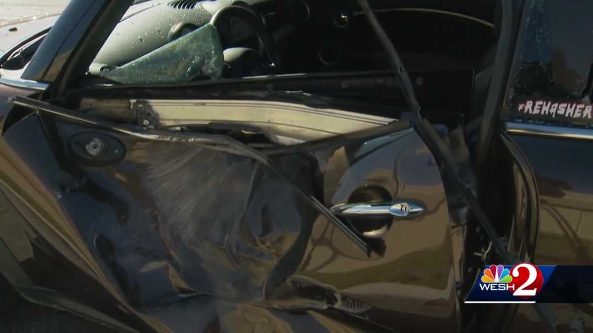 Massive tires fly over I-4 barrier, damaging parked car in nearby ...
