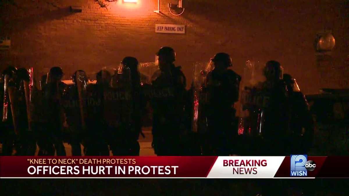 Milwaukee police officer shot during protest, businesses damaged