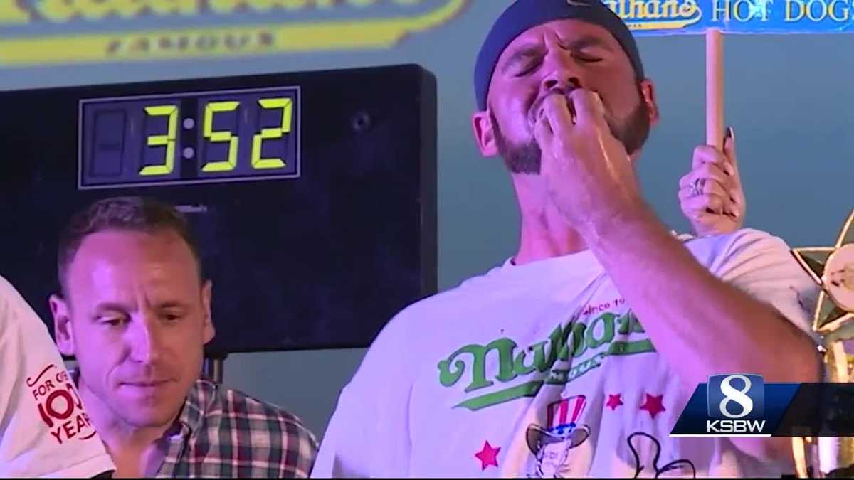Joey Chestnut watches Steven Hendry win Santa Cruz hot dog eating contest