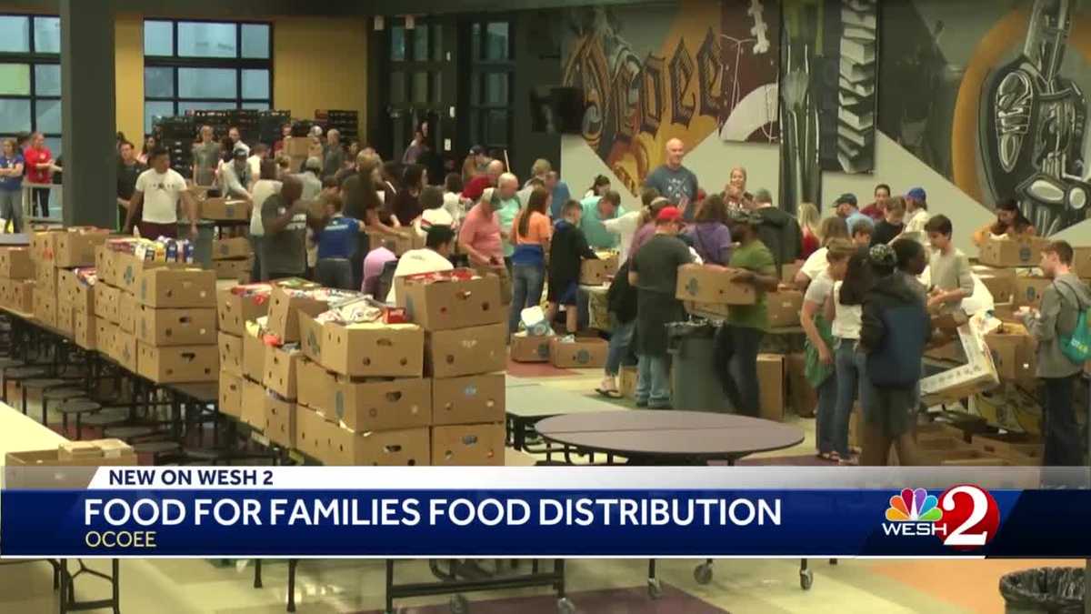 Local food bank distributes food to families in need during the holidays