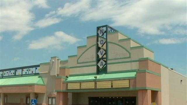 Closed sign appears at movie theater