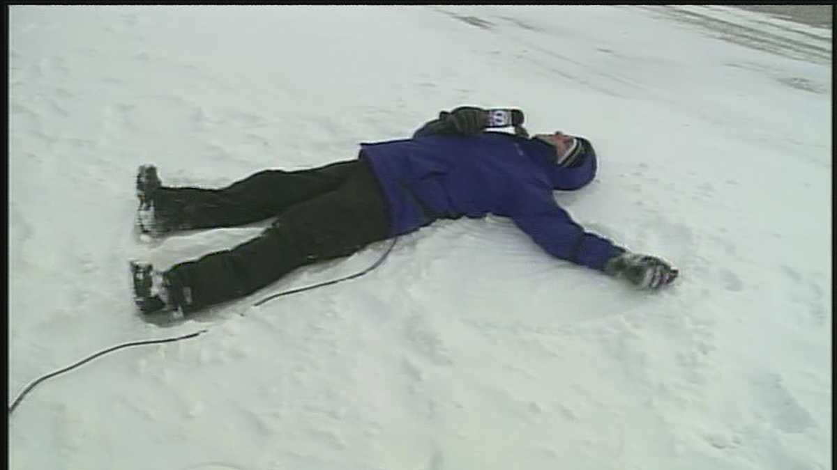 KOAT reporter makes snow angel in Grants