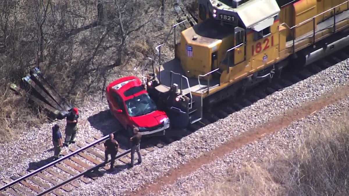 Two dead after car and train collide near Minco