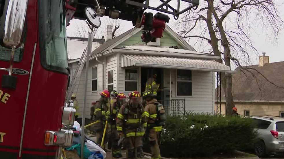 Omaha house fire injures one person
