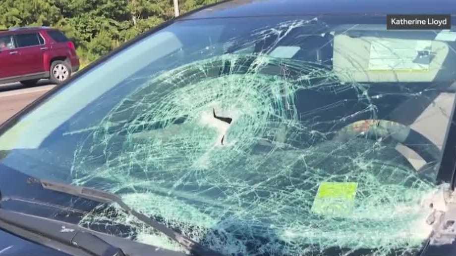 Driver narrowly escapes injury as pipe crashes through windshield