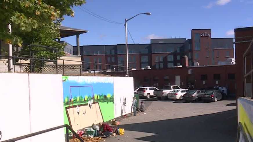 Community turns blighted back ally into inviting walkway