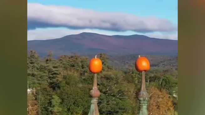 Pumpkins appear on top of Rounds Tower at Plymouth State University