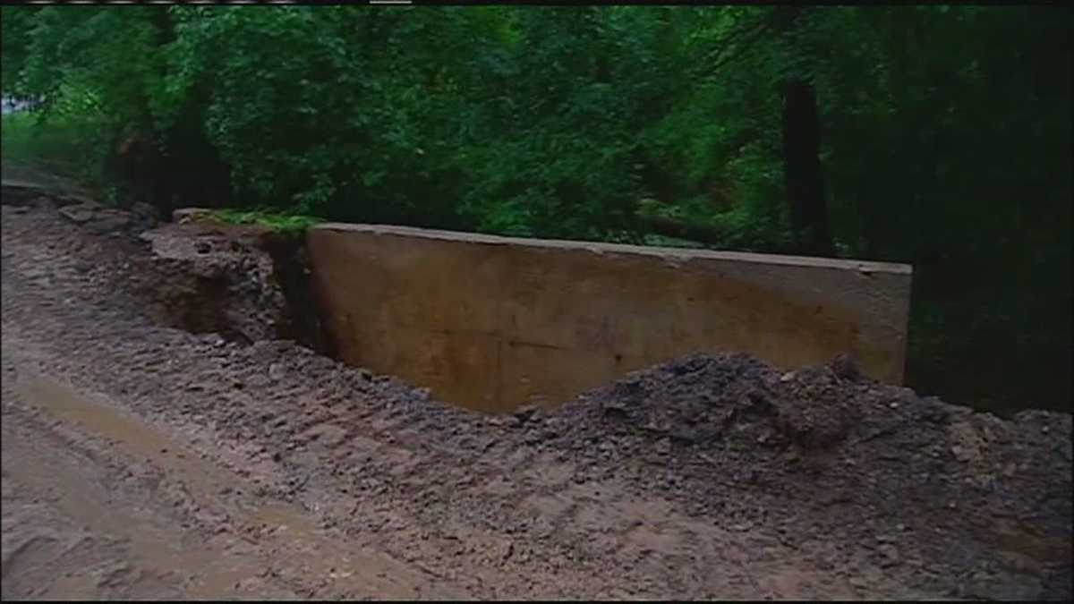 Floods wash out bridge in Weston