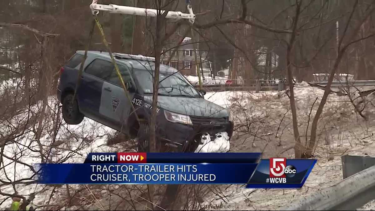 Tractor-trailer hits cruiser, injuring trooper