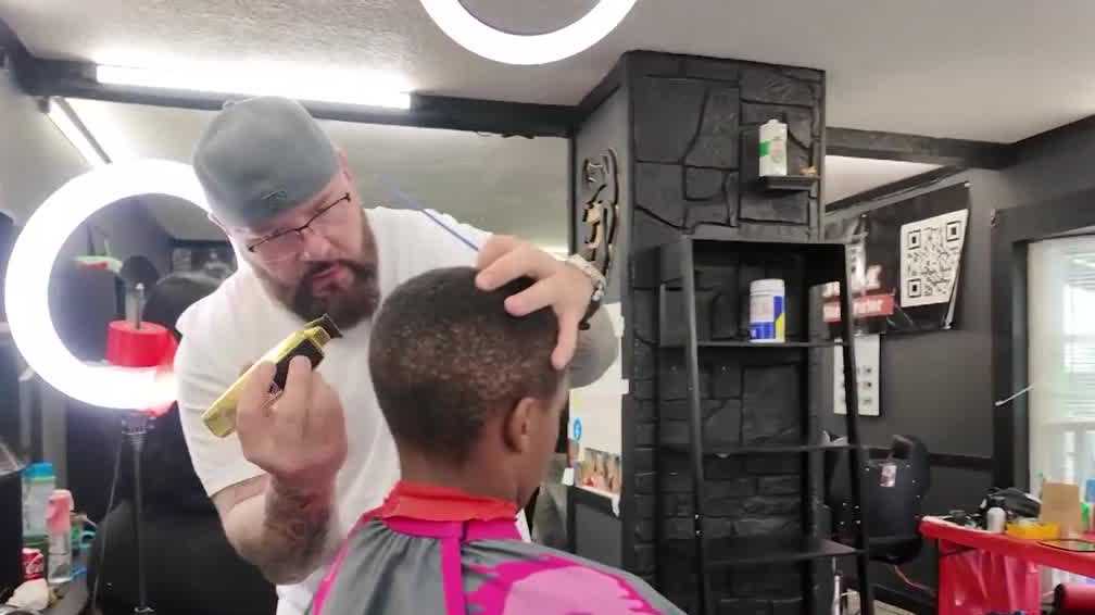 Manchester barbershop hosts 2025 back-to-school community bash
