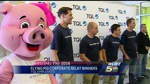 Trophy presented to Flying Pig corporate relay winners
