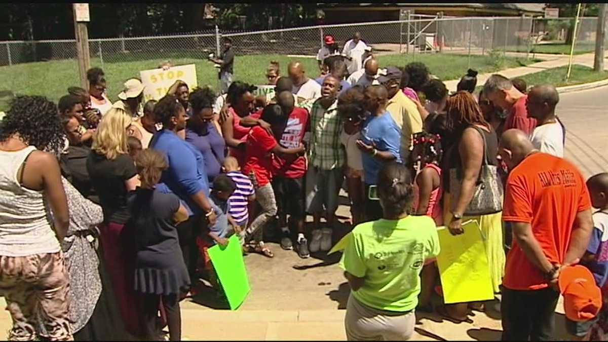 Community gathers for peace rally after child wounded in drive-by shooting