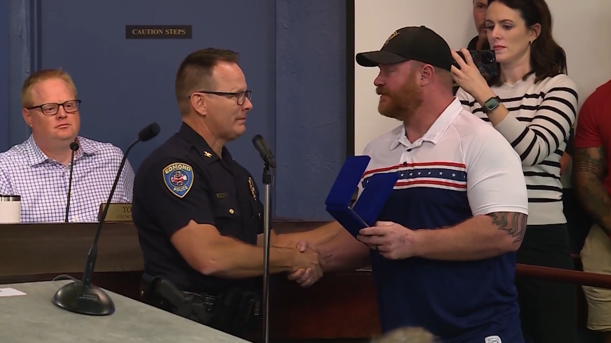 Edmond honors officer hit during pursuit with prestigious medals