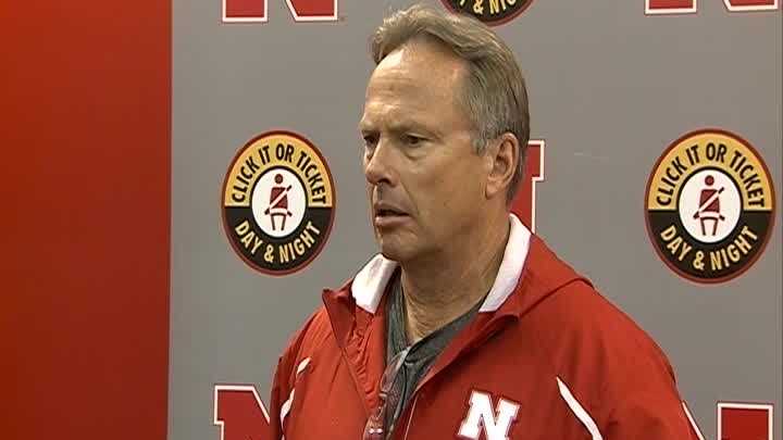 Mark Banker speaks to the media following Thursday's altered practice
