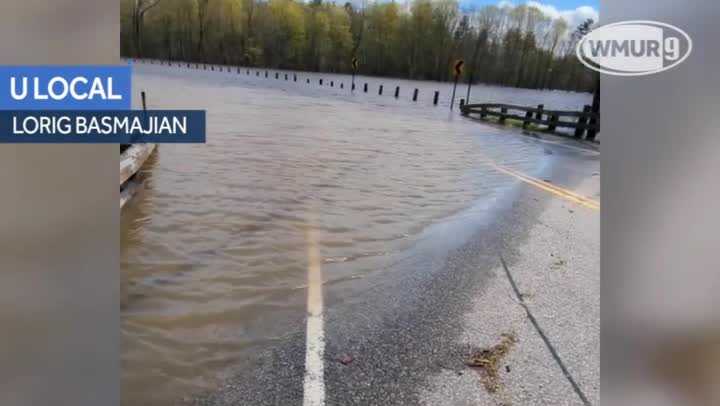 Video shows flood waters inundating West Side Road in Conway, NH