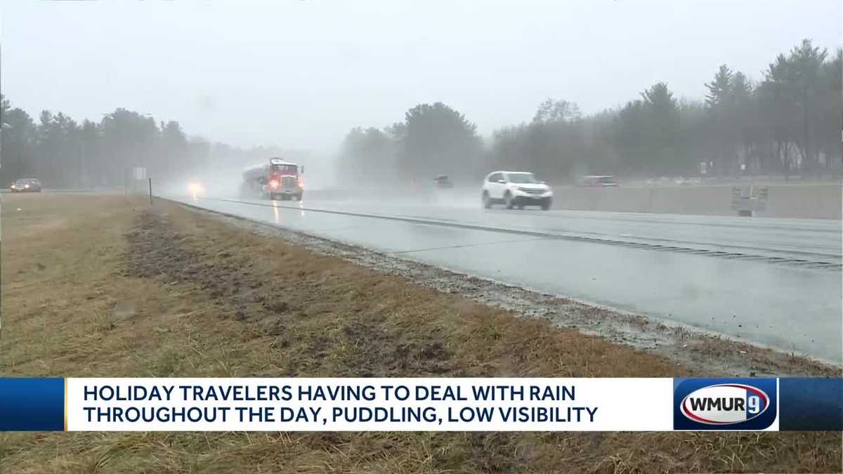 Holiday travelers deal with rain, low visibility on roads