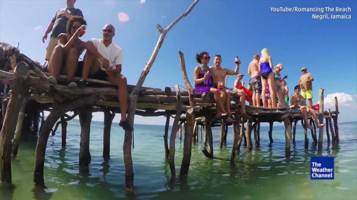 This Jamaican bar is completely surrounded by water