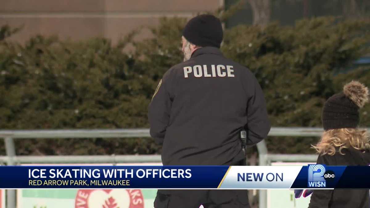 Kids ice skate with Milwaukee police officers at Red Arrow Park