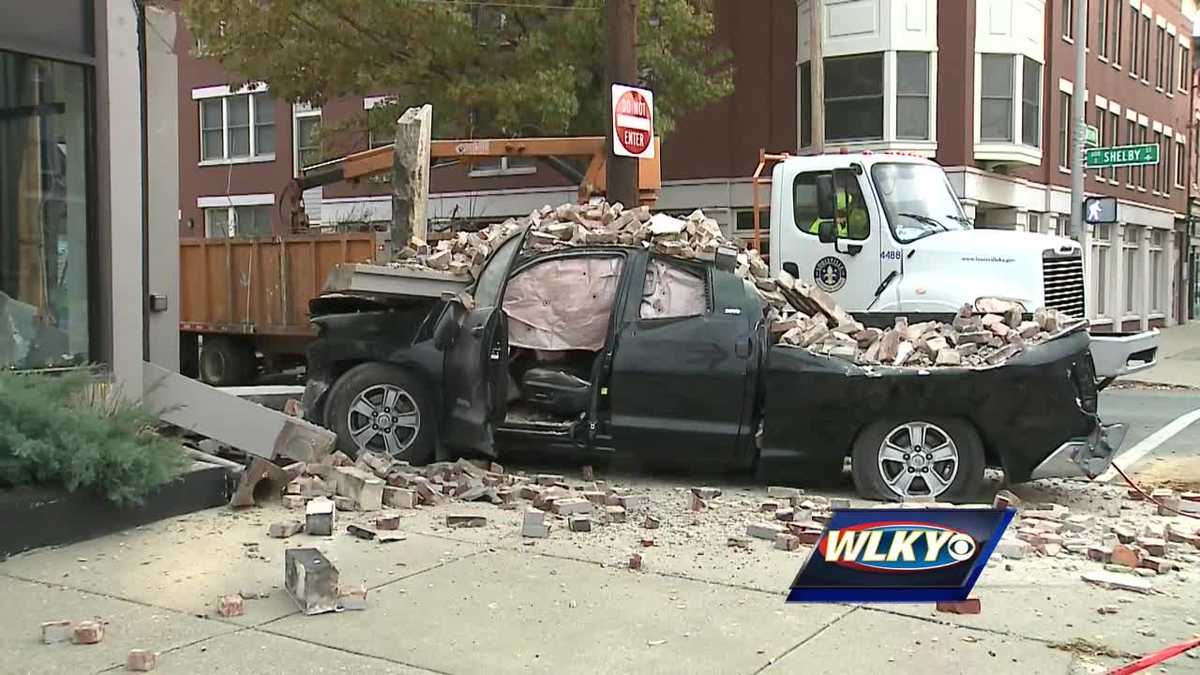 2 injured after truck crashes into historic building