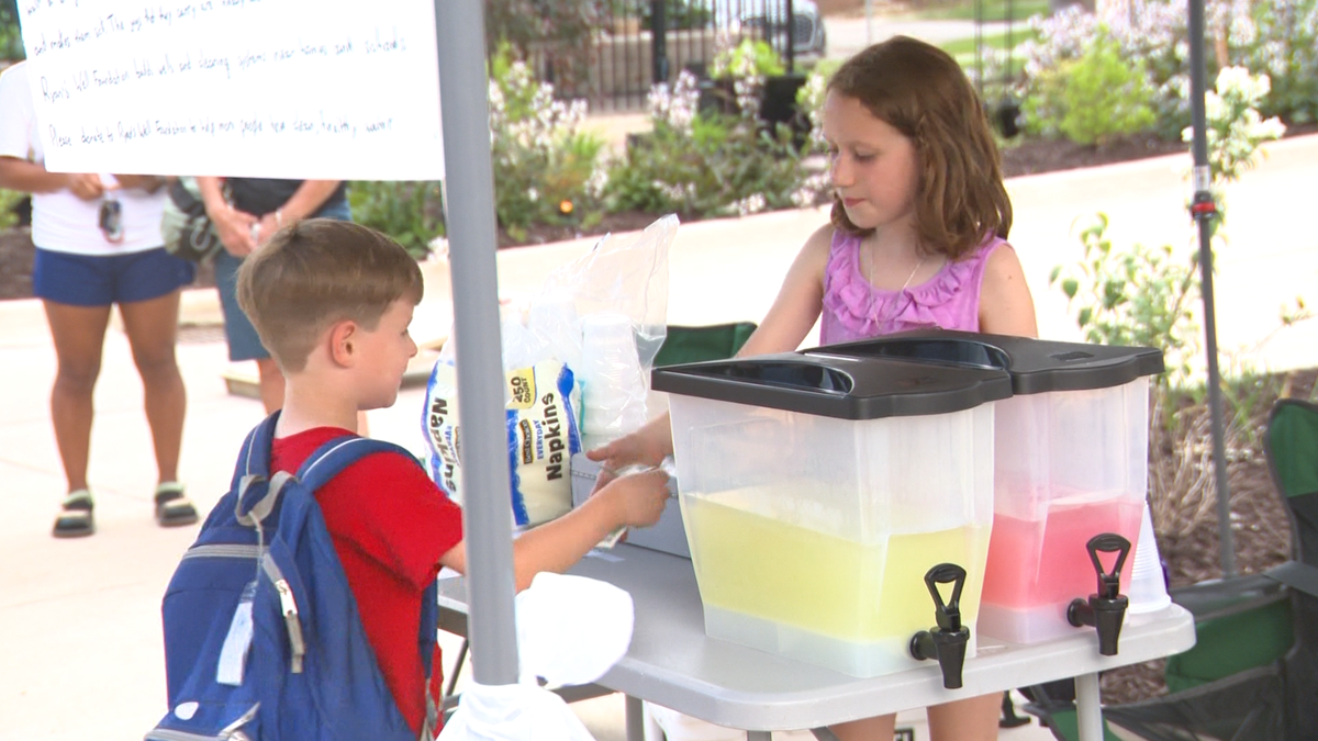 Third grader sets up lemonade stand for clean water efforts
