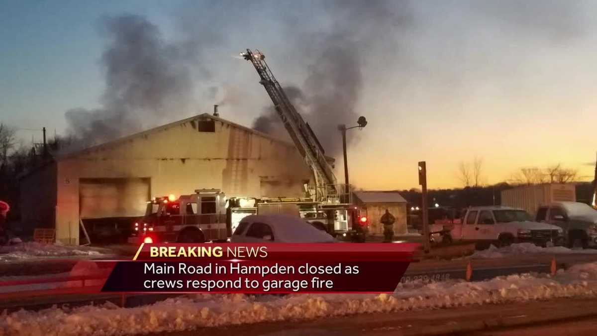 Crews battle fire at Hampden's Hughes Bros.