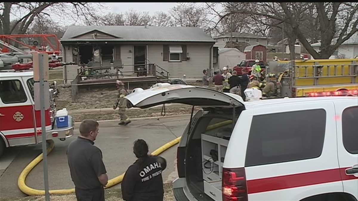 House fire critically injures two