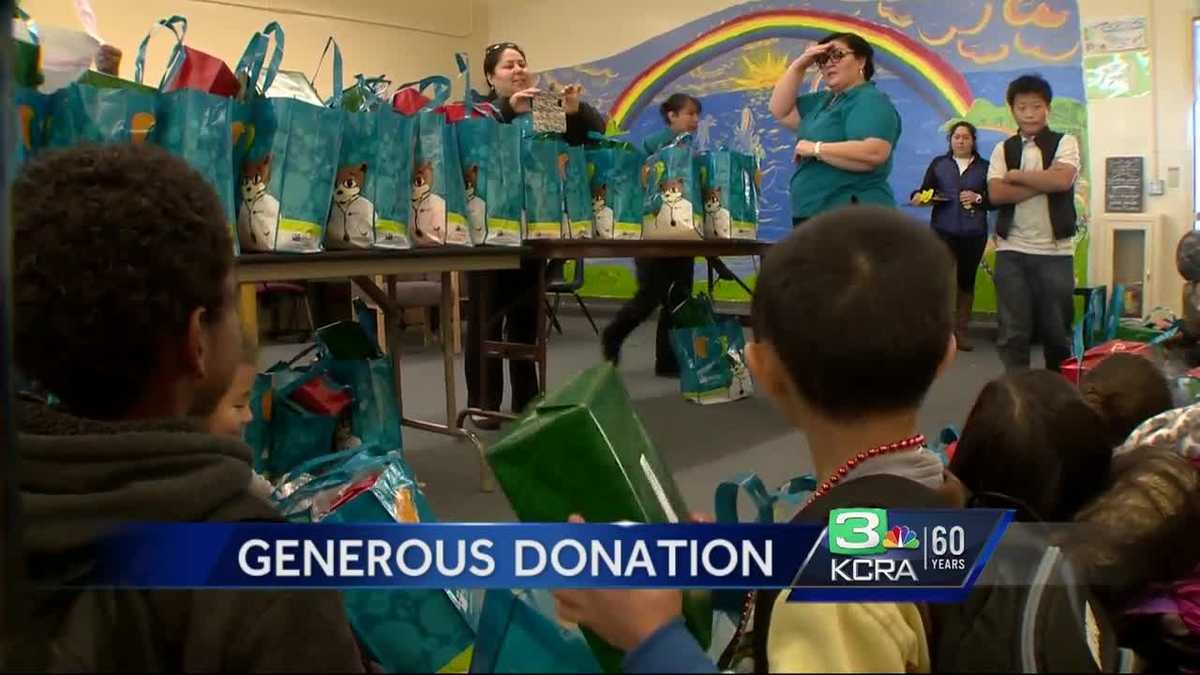 Dozens of elementary school students get shoes, jackets