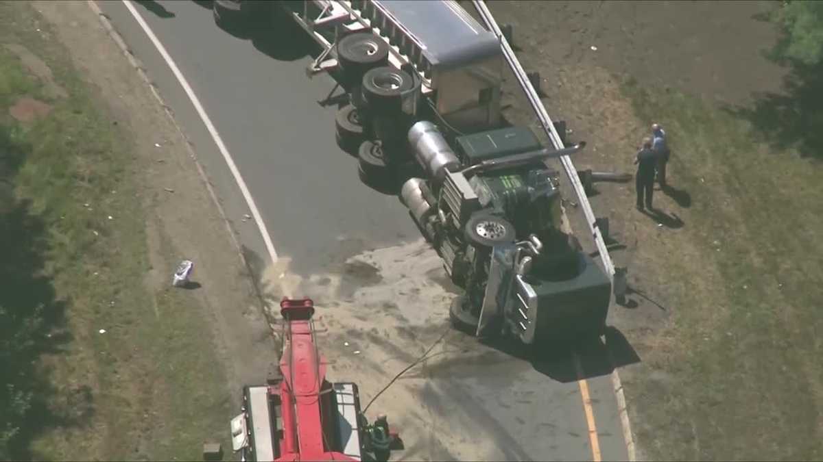 Truck overturns, spills loam on Route 128 ramp in Lexington