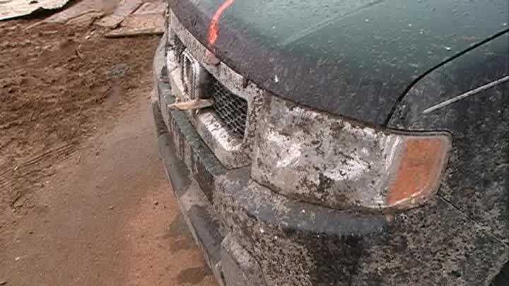 Damaged cars litter tornado's path in Moore, Okla. - KETV