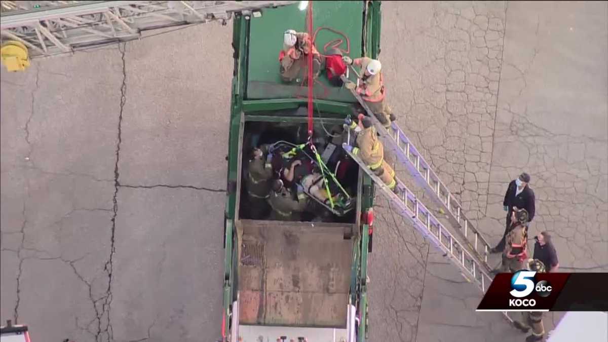 STUCK IN GARBAGE TRUCK: Firefighters rescue person from garbage truck ...