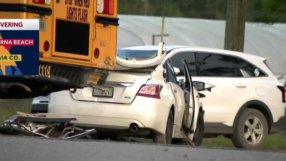 Car stuck under school bus on SR-44 in Volusia County