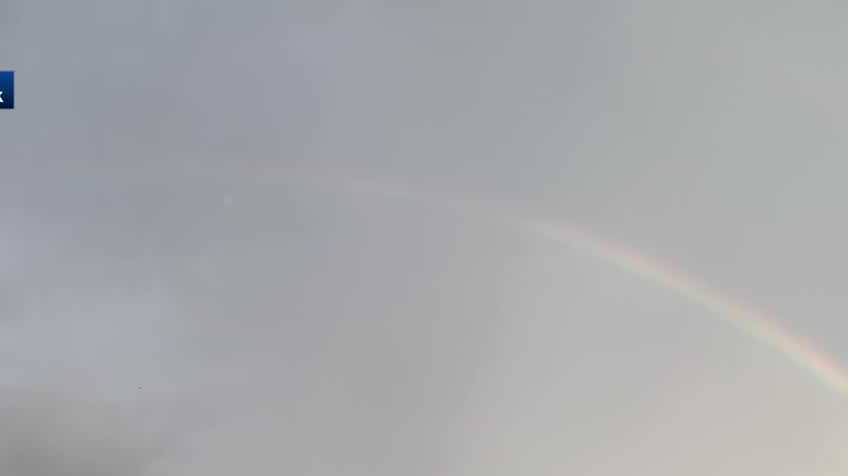 Wake Up Call: Rainbow over North Shore