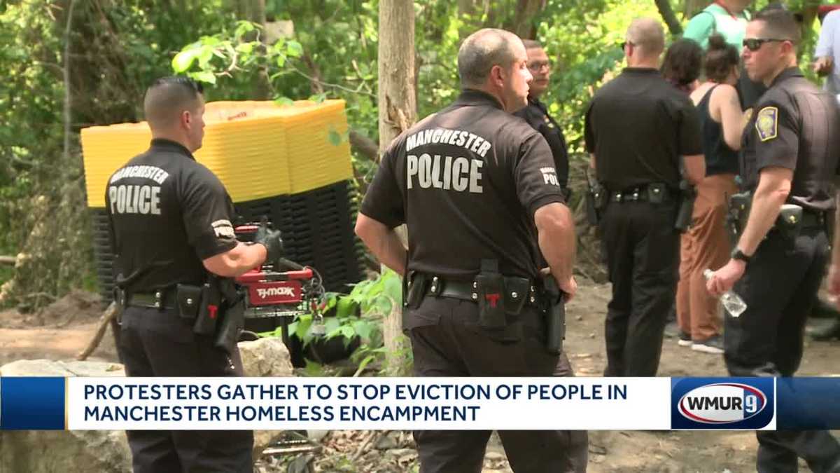 Protesters gather to stop eviction of people in Manchester homeless ...