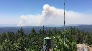 Wildfire threatening thousands of structures