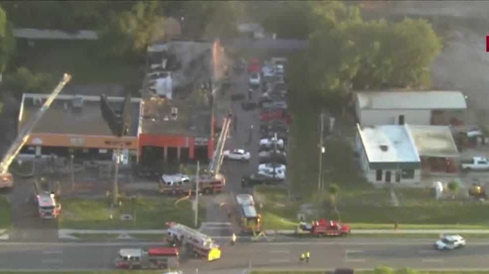 Multiple cars damaged in fire at Orange County used car lot, officials say