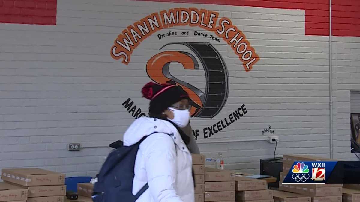 Guilford County Schools distributes laptops to Swann Middle School students