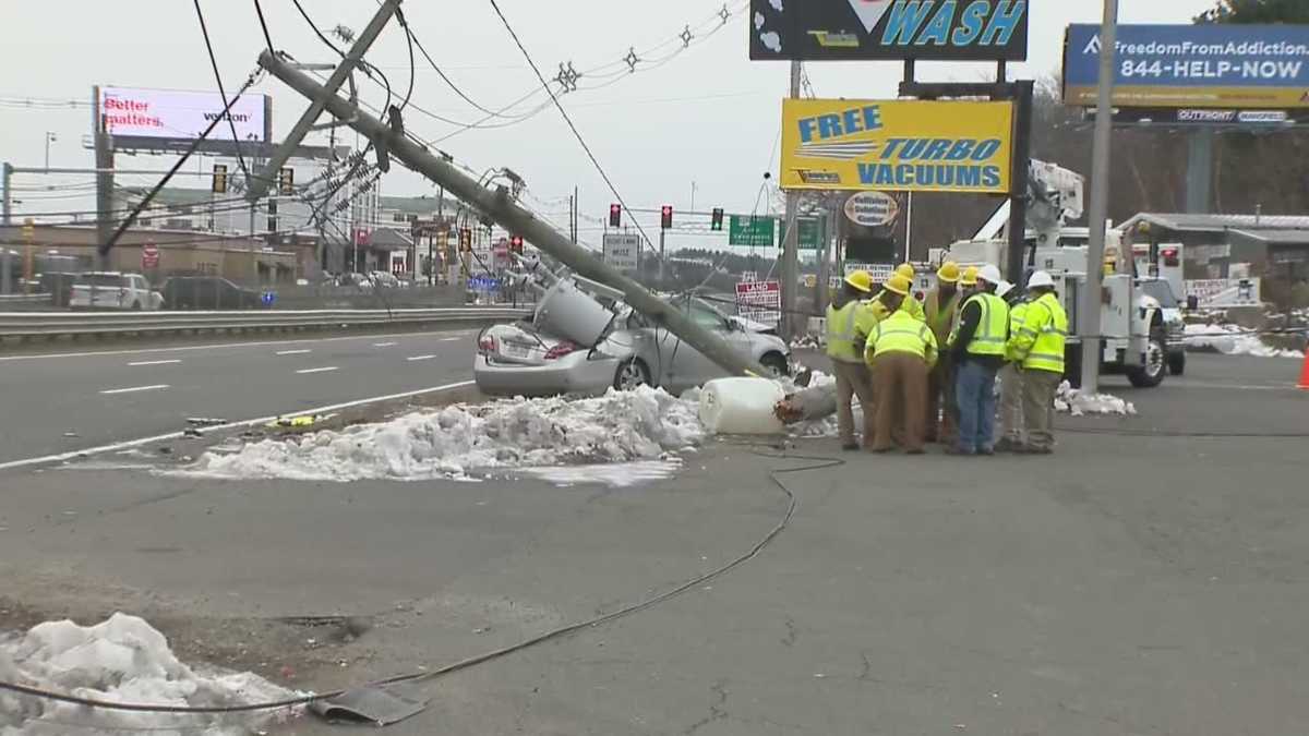 Car Slams Into Utility Pole