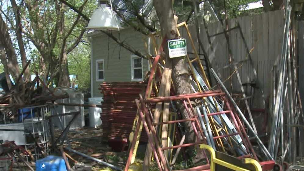 Shawnee homeowner owes city thousands for 'junk' outside properties