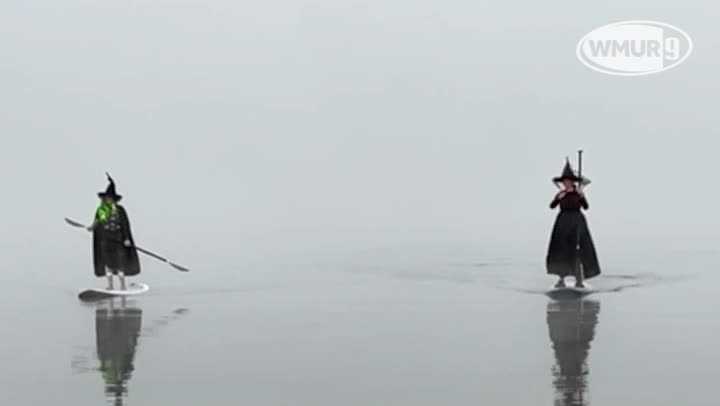 Video: Witches float on foggy NH Lake