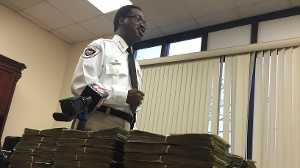 Sheriff shows off county's largest cash bust