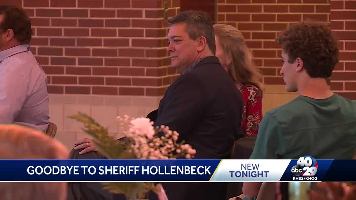 Sheriff Hollenbeck thanked for his service at retirement party.