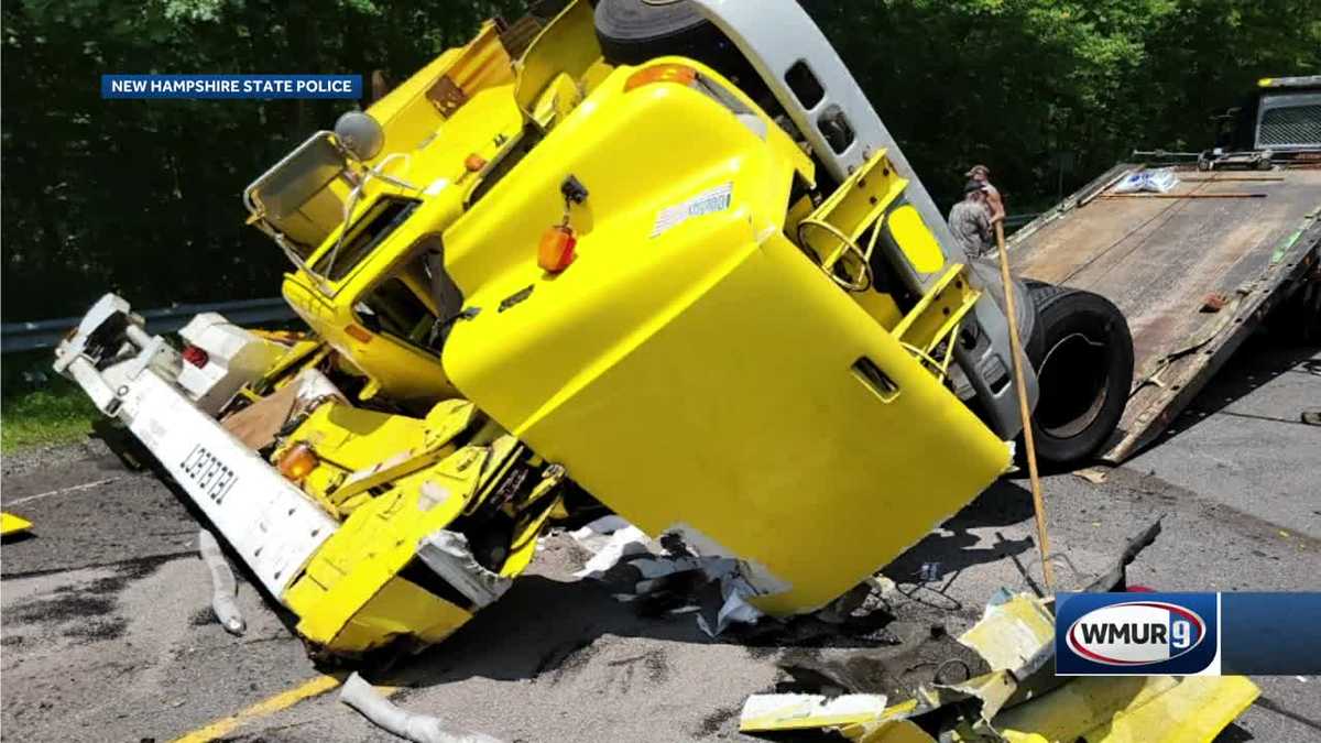 Utility bucket truck rolls over after crash in Keene, NH