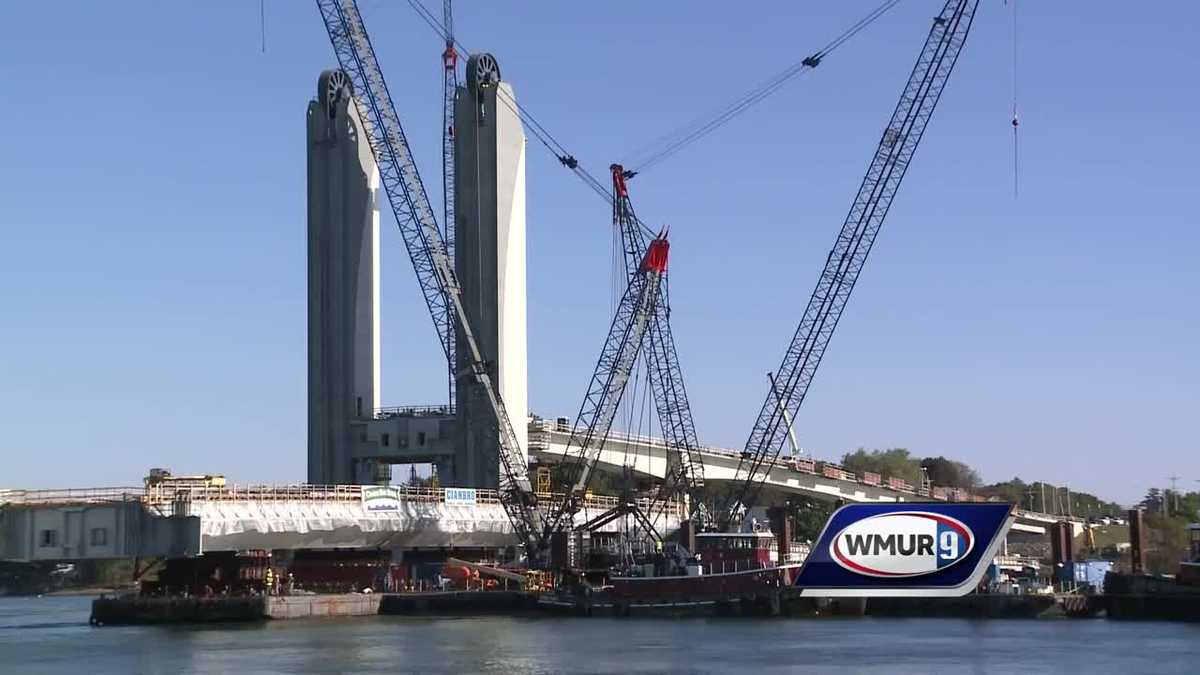 Massive center span floated into place for new Sarah Long Bridge