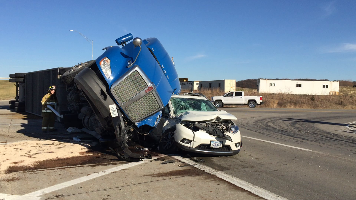 State Patrol: Semi-truck loaded with hogs crashes into car